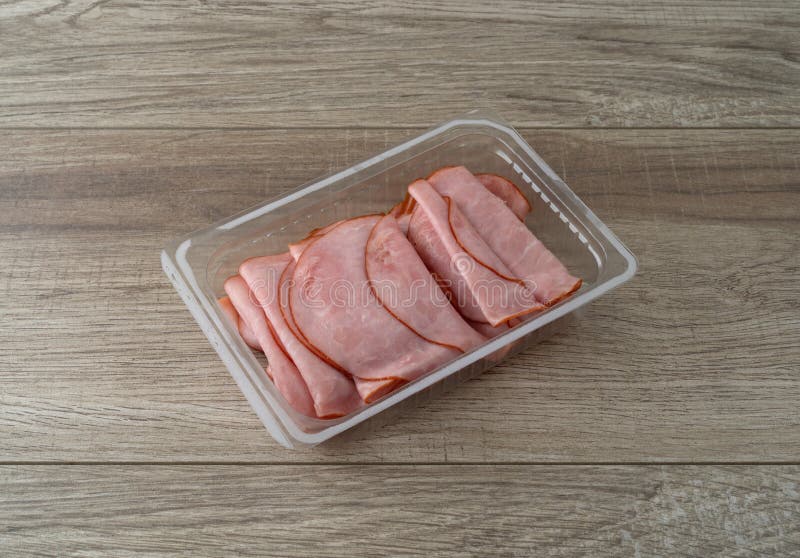 Thin Sliced Ham in a Plastic Tray on a Table Top Stock Image - Image of ...