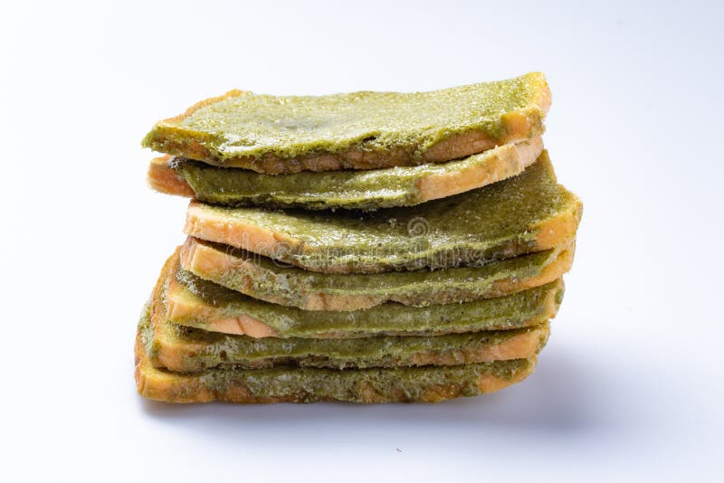Thin Slices of Toasted Bread Topped with Green Tea Cream on White ...