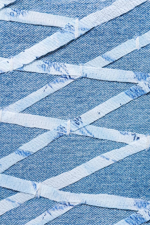 Thin Stripes Cutted from Fine Cloth, Sewn on Blue Denim in Geometric ...