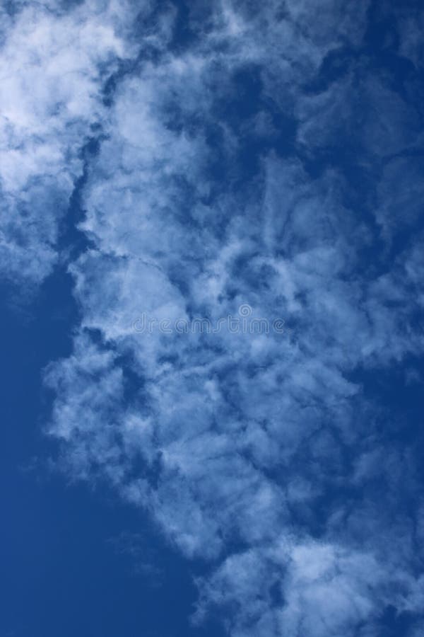 Thin White Broken Clouds Against a Blue Sky Stock Image - Image of ...