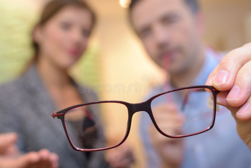 Thin Wire Framed Spectacles Close Focus in Optician Hands Stock Image ...