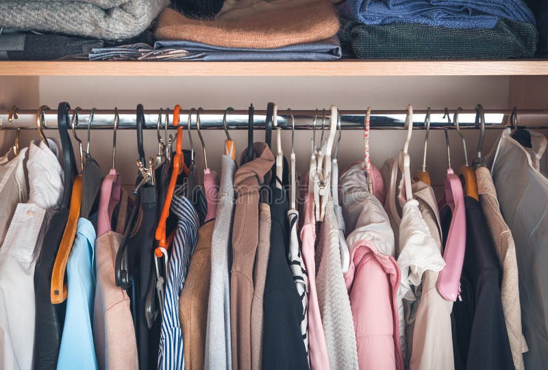 Things on Hangers and on a Shelf in the Closet. Stock Photo - Image of ...