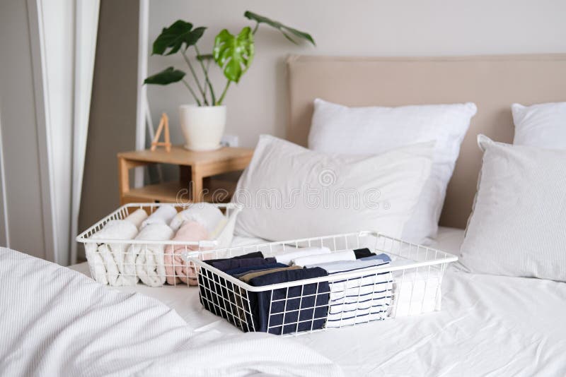 Things in Mesh Storage Containers. Vertical Storage of Clothing Stock ...