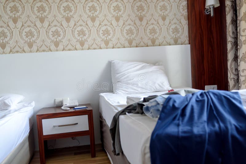 Things are Scattered Randomly on the Hotel Bed, Stock Photo - Image of ...