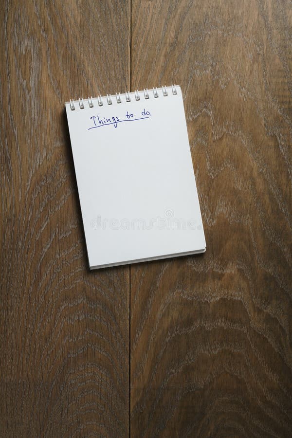 Things To Do List on Notepad on Wood Table Stock Image - Image of paper ...