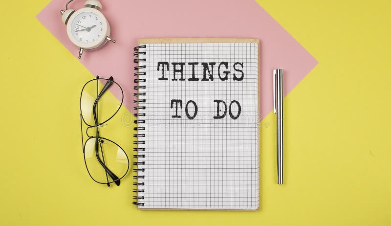 THINGS TO DO Notice on the Notepad with Pen, Glasses and Alarm Clock ...