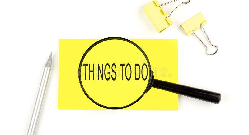 THINGS TO DO Text on the Sticker through Magnifier. View from Above ...