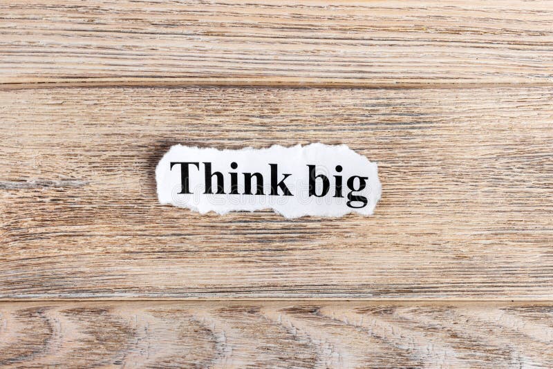 Think Big Text on Paper. Word Think Big on Torn Paper Stock Image ...