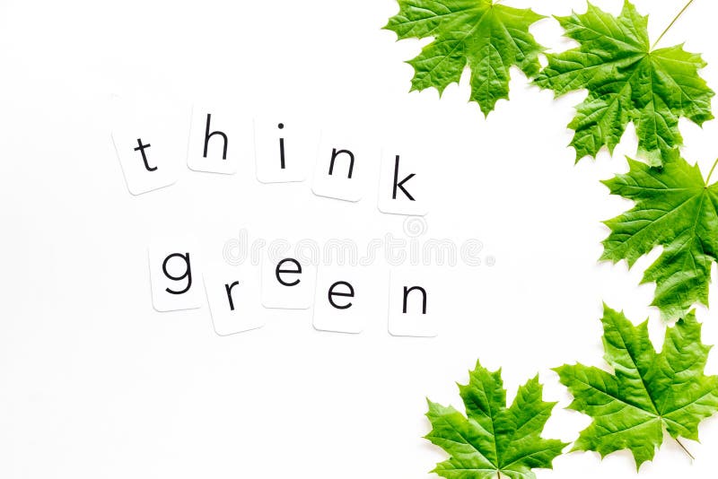 Think Green Concept with Maple Leave on White Background Top View Stock ...