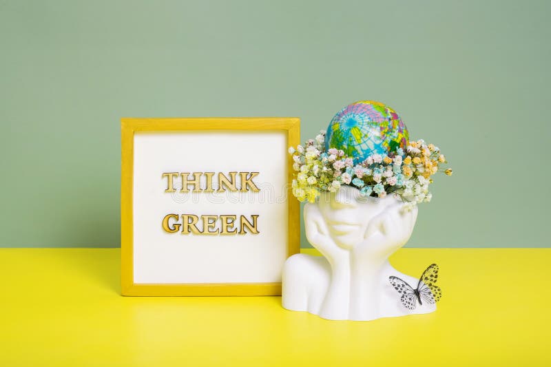 Think Green Text with World Globe in Head with Flowers. Environment for ...