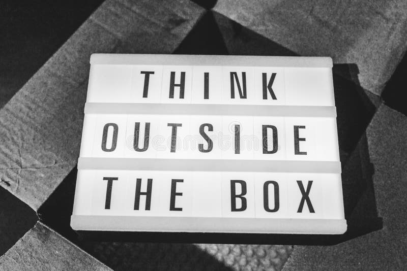 Think Outside the Box Message on Lightbox on Top of Open Parcel Stock ...