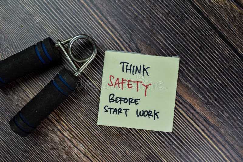 Think Safety before Start Work Write on Sticky Notes Isolated on Wooden ...