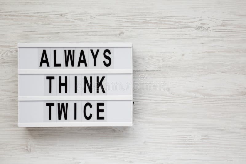 `always Think Twice` Words on a Modern Board on a White Wooden Surface ...