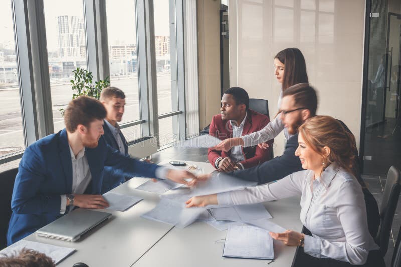 Thinking African Business Man Surrounded by Moving People Stock Photo ...
