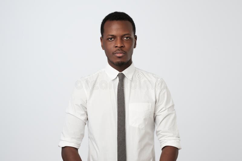 Thinking Afro American Man with Serious Expression Looking into Camera ...