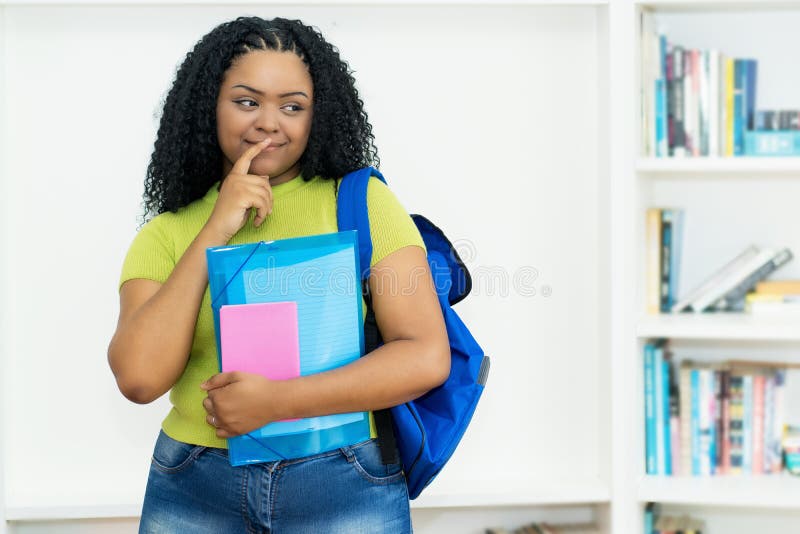 Thinking Black Female Student with Backpack and Paperwork Stock Photo ...