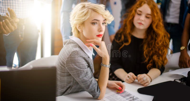 Thinking Blond Leader of Business Team Stock Photo - Image of caucasian ...