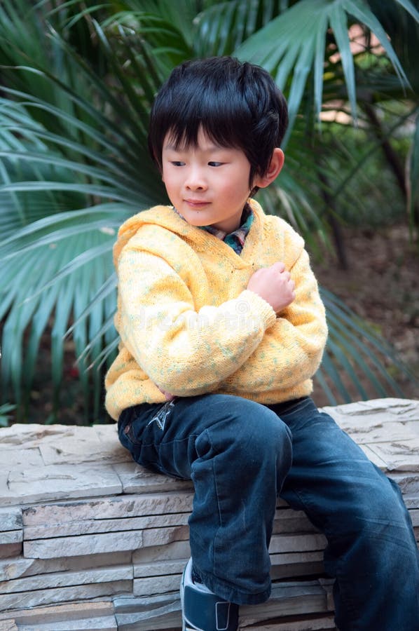 Thinking boy stock image. Image of preschool, sitting - 13377827
