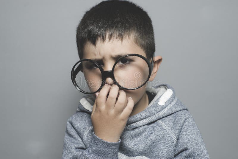 Thinking, Boy with Big Glasses Very Serious and Thinking Stock Photo ...