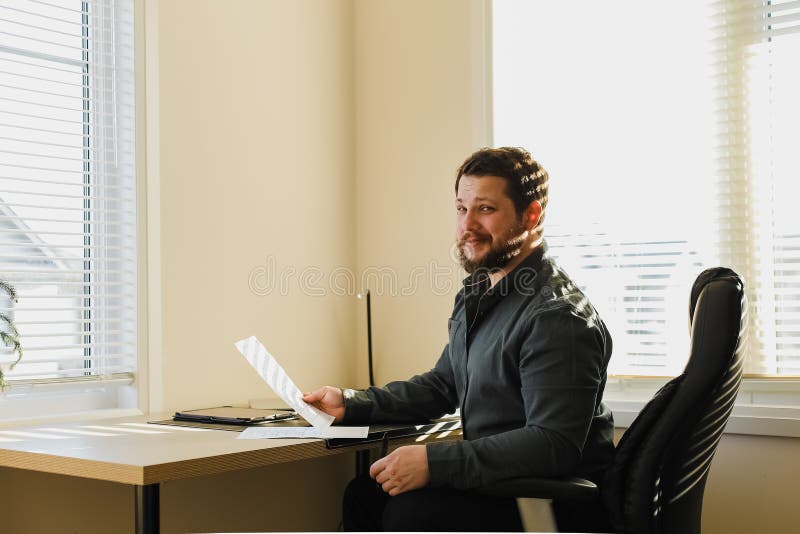 Thinking Business Enterpreneur Sitting at Office with Documents, Tablet ...