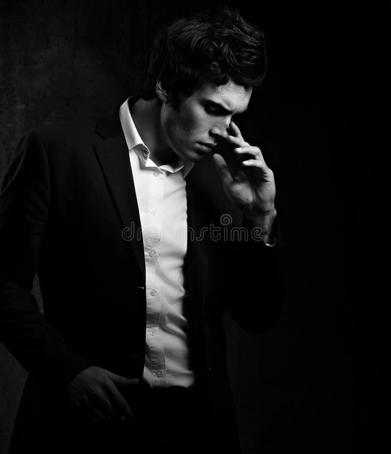 Thinking Charismatic Man Posing and Looking with Hand Near the F Stock ...