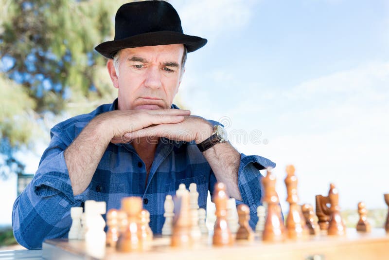 Thinking chess strategy stock image. Image of elderly - 101208937