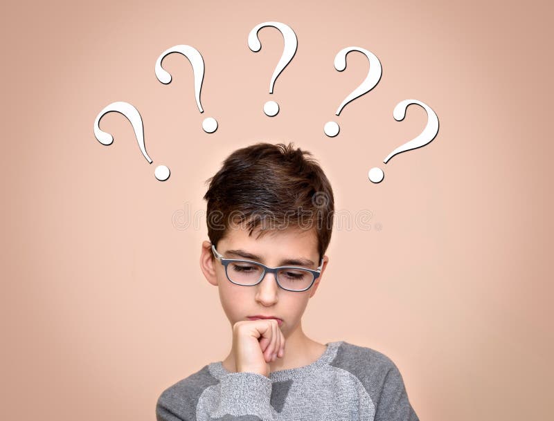 Thoughtful Young Boy with Question Marks Above His Head Stock Photo ...