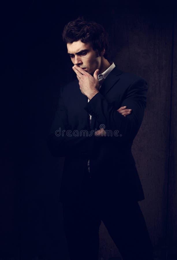 Thinking Charismatic Man Posing and Looking with Hand Near the F Stock ...