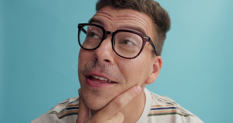 Thinking, Face and Man with Glasses in Studio for Brainstorming ...