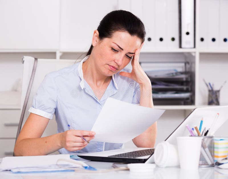 Thinking Female in Office Sitting at the Table Stock Photo - Image of ...