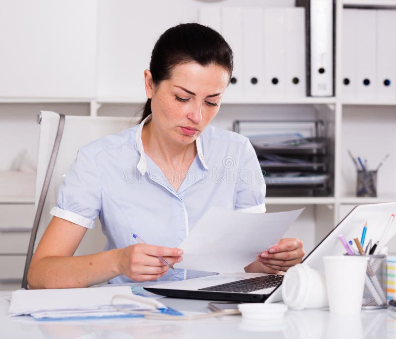 Thinking Female in Office Sitting at the Table Stock Photo - Image of ...