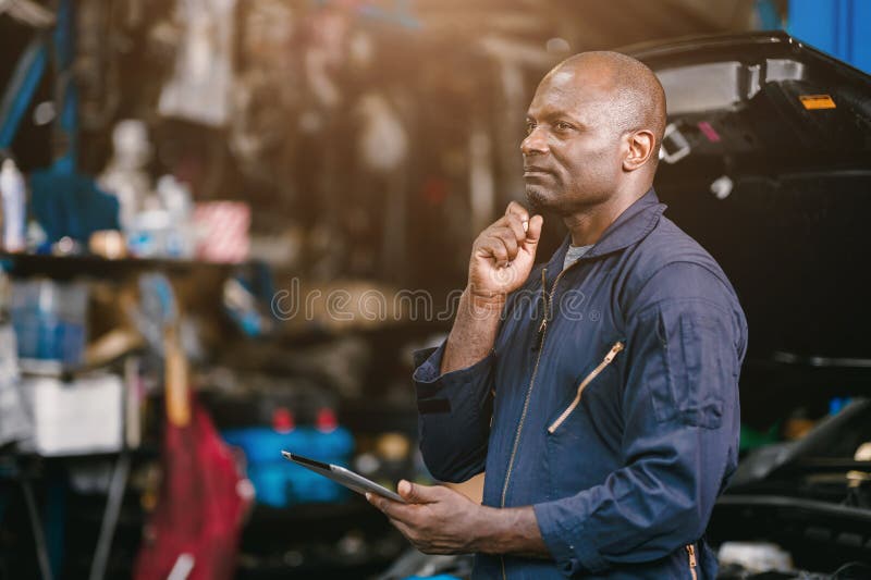 Thinking Garage Worker. Intelligence Mechanic Auto Service Stock Photo ...