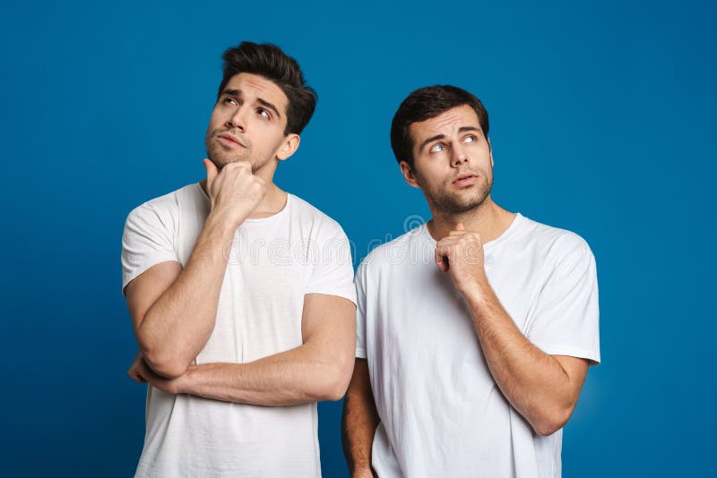 Two guys posing isolated stock photo. Image of person - 25061320