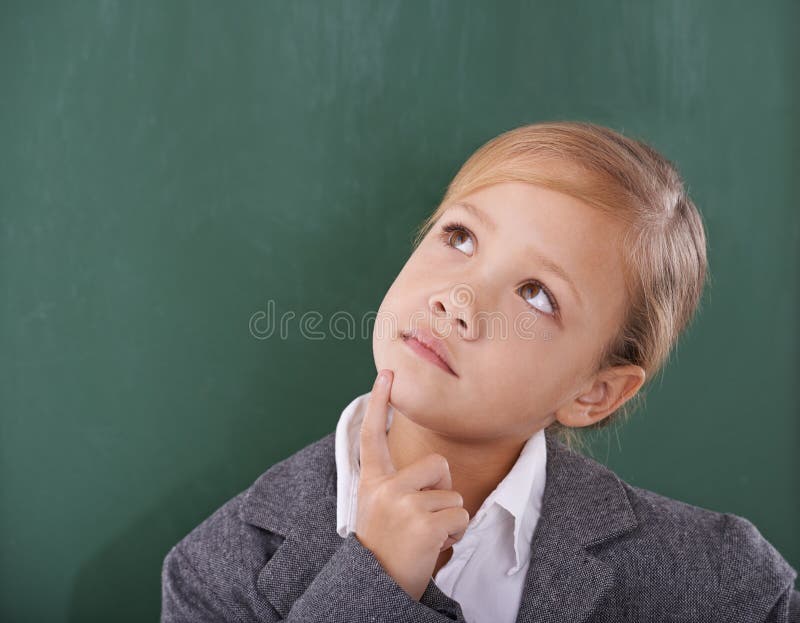Shes Ready To Learn. a Young Schoolgirl Standing in Front of a ...