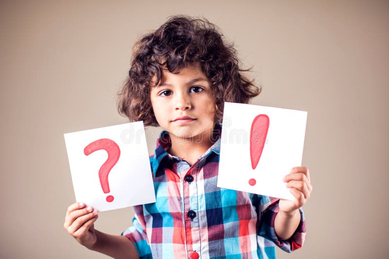 Thinking Kid Boy with Question and Exclamation Signs Stock Photo ...