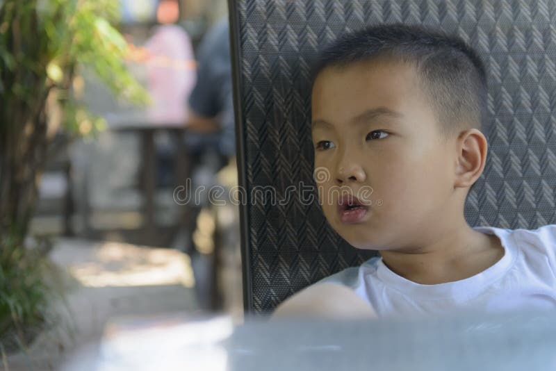 Thinking kid stock image. Image of trance, thinking, chinese - 77256261