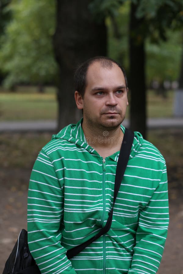 Thinking man on a bench stock image. Image of thinking - 58643921