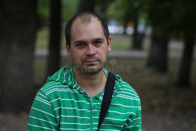 Thinking man on a bench stock image. Image of attractive - 58643959