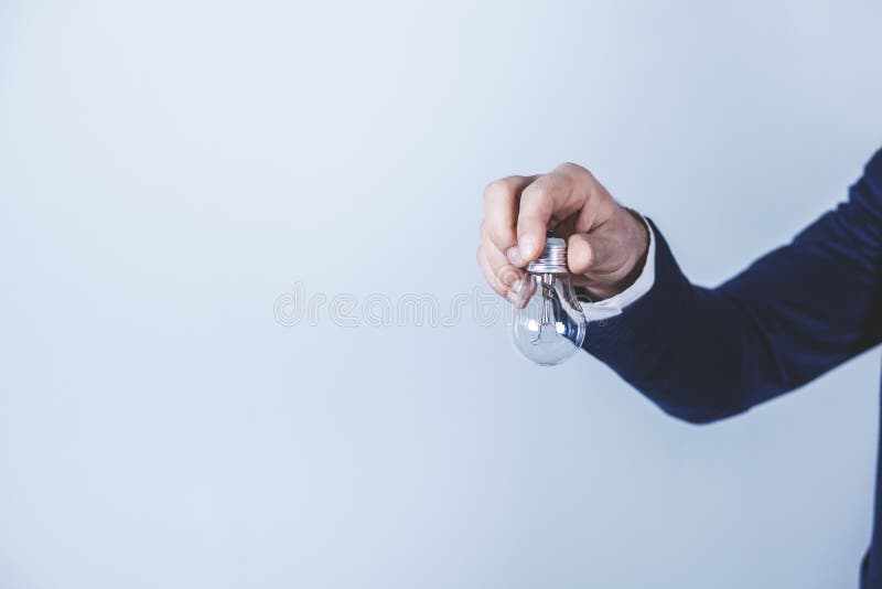 Thinking man hand bulb stock image. Image of creative - 171804509
