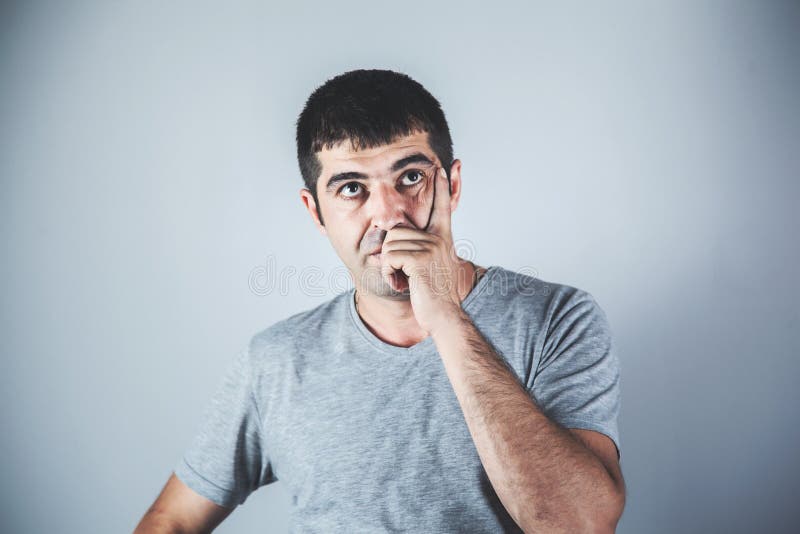 Thinking man hand in face stock photo. Image of business - 152955884