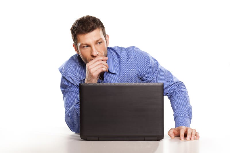 Thinking man and laptop stock photo. Image of conceited - 29261032