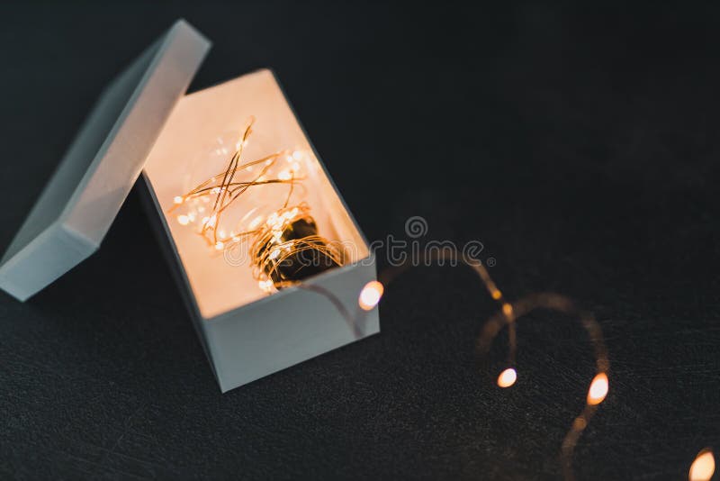 Thinking Outside the Box, Idea Lightbulb Wrapped Up in String Lights ...