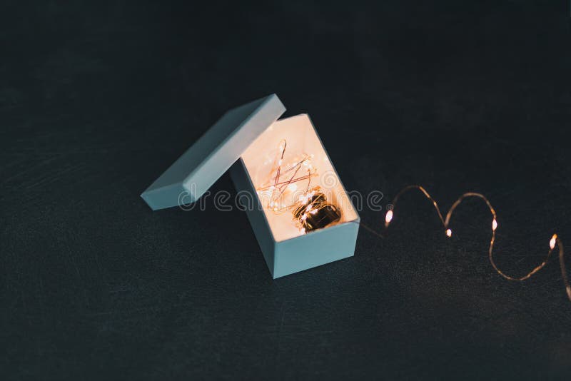 Thinking Outside the Box, Idea Lightbulb Wrapped Up in String Lights ...