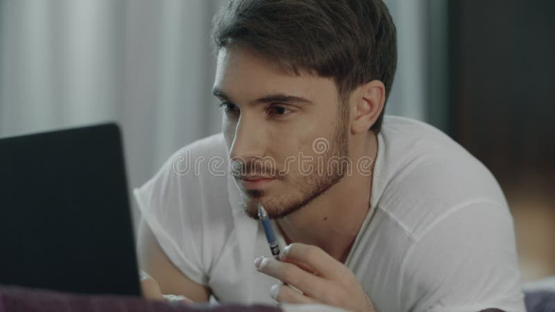 Thinking Person Looking Computer in Bed. Handsome Student Use Education ...