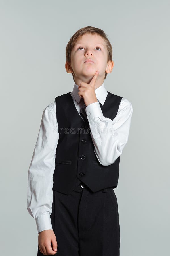 Thinking schoolboy stock image. Image of education, study - 46520807