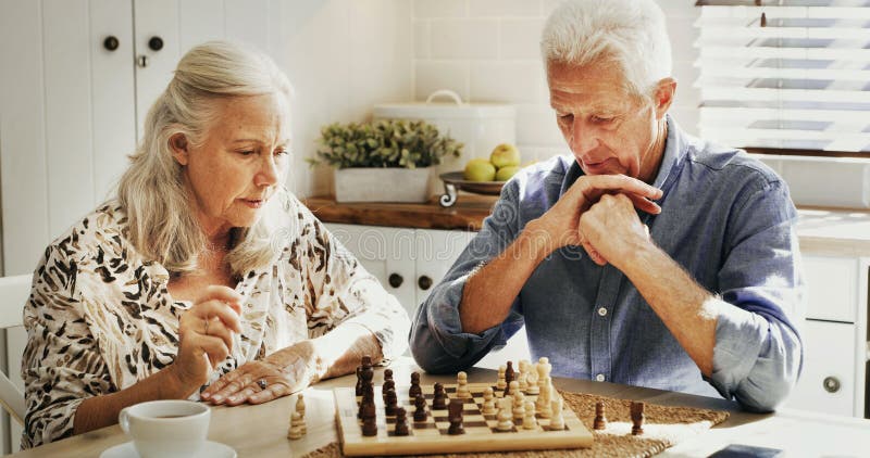 Thinking, Senior Couple and Playing Chess in Home with Decision, Problem Solving and Strategy ...