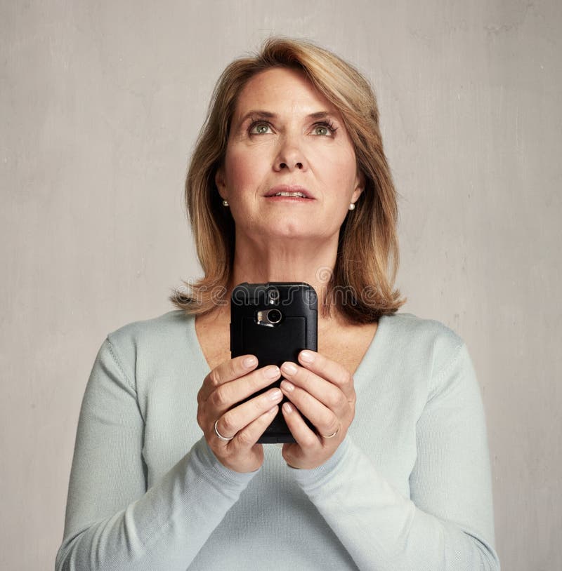 Thinking Woman with Smartphone Stock Image - Image of people, gray ...