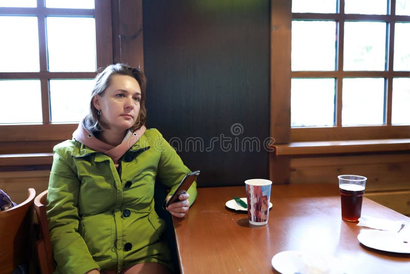 Thinking Woman at Table in Restaurant Stock Photo - Image of break ...
