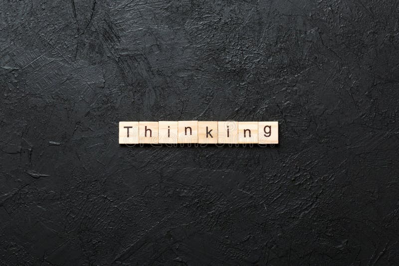 Thinking Word Written on Wood Block. Thinking Text on Cement Table for ...