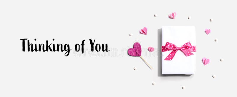 Thinking of You Message with a Gift Box and Hearts Stock Photo - Image ...